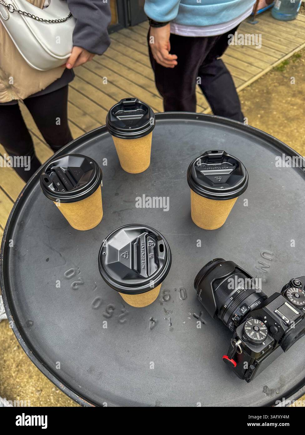 Casual Coffee Gathering with Friends Stock Photo - Alamy