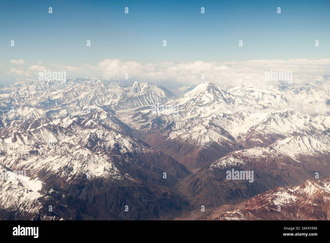 Aerial view of Chile's Andes reveals rugged peaks, valleys, and rivers ...