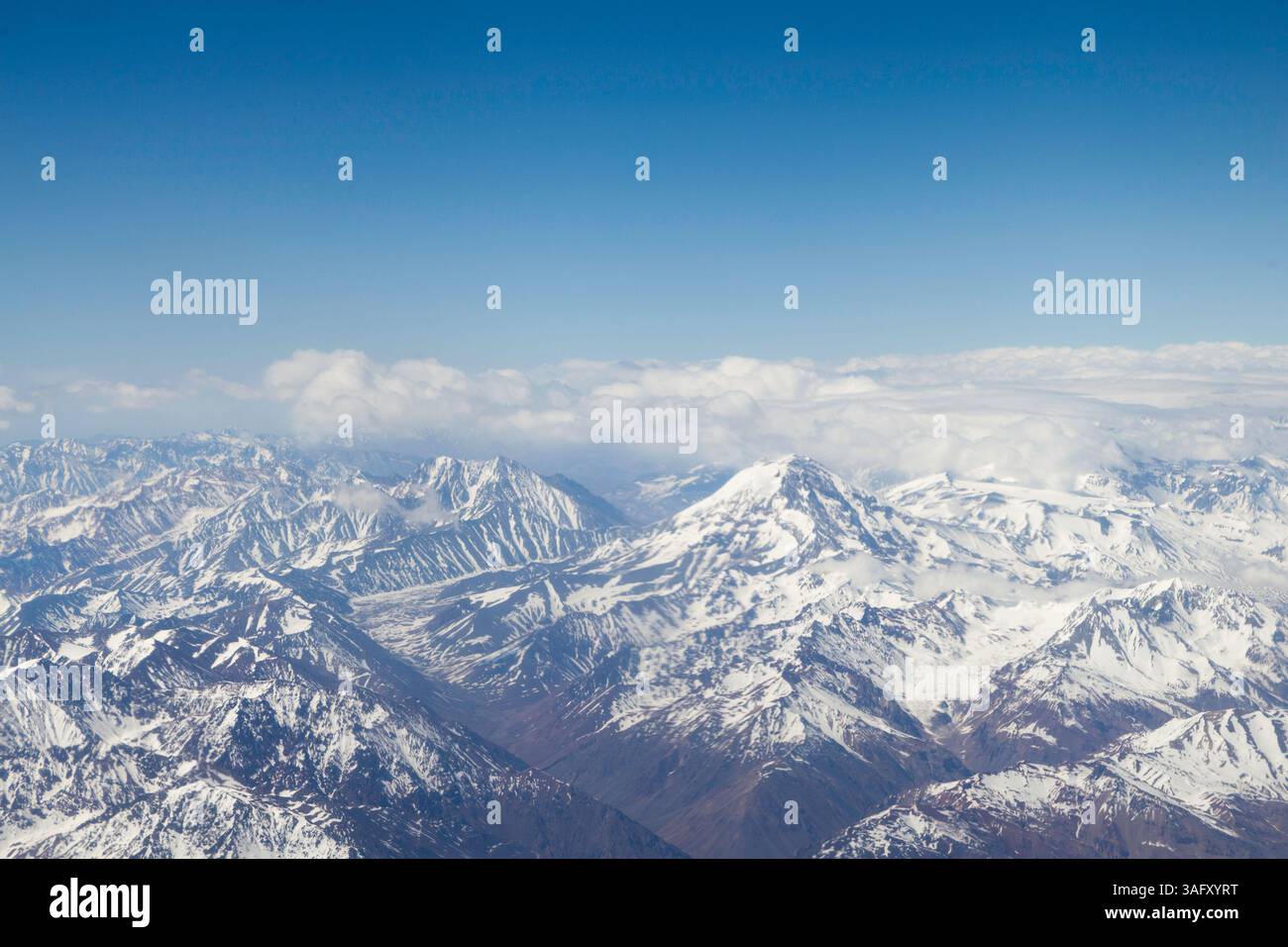 Aerial view of Chile's Andes reveals rugged peaks, valleys, and rivers ...