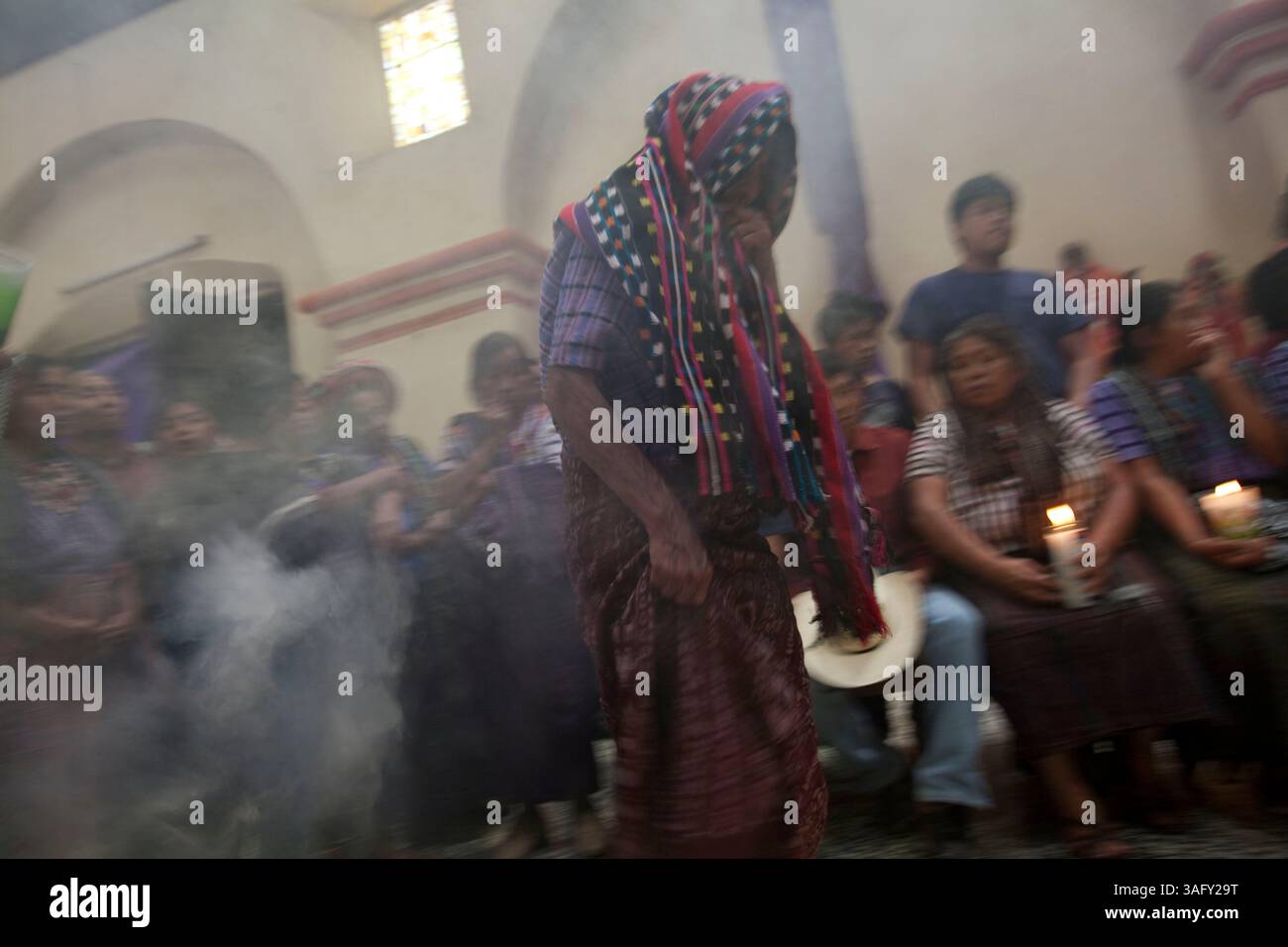 April 04, 2012 - Santiago Atitlan, Solol, Guatemala - A woman walks to ...