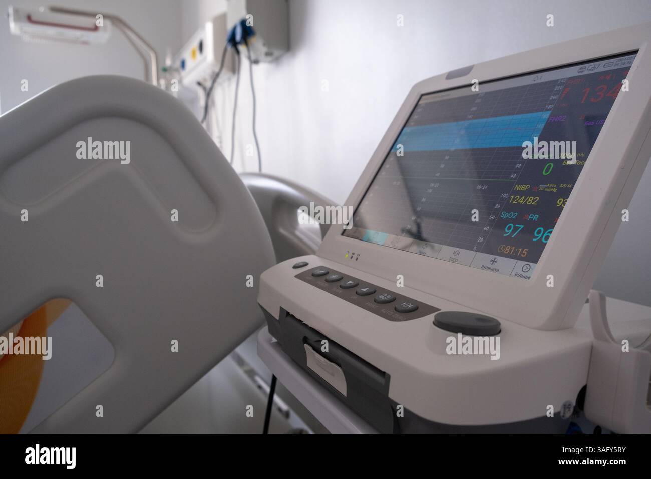 Medical Monitor Displaying Vital Signs in Hospital Room Stock Photo - Alamy