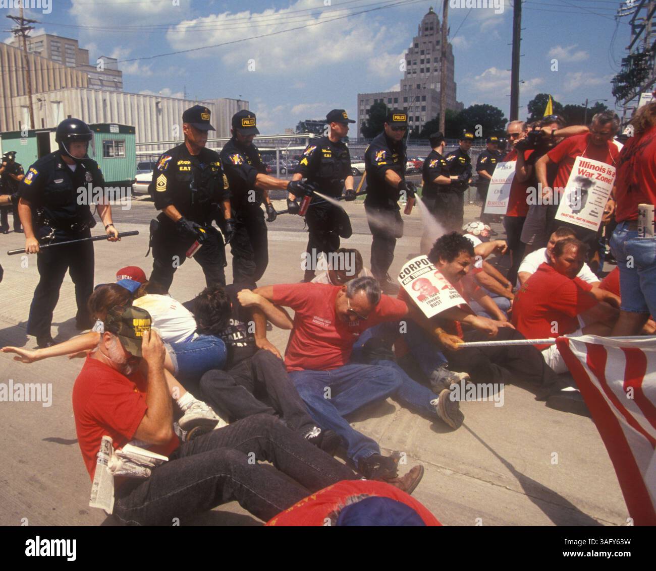 Jun 25, 1994; Decatur, IL, USA; Police use pepper spray on locked-out ...