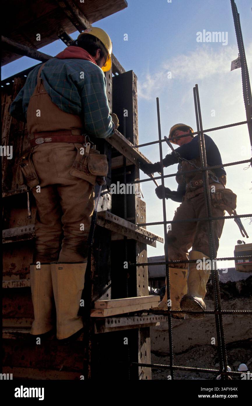 Jan 22, 1996; East Lansing, Michigan, USA; Carpenters put together forms that will shape the ...