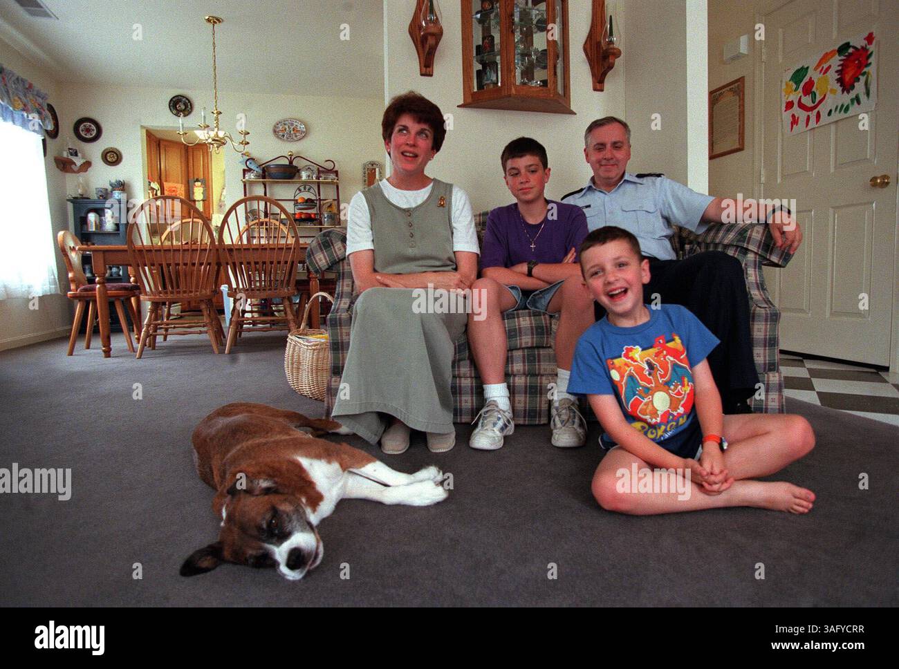 US Air Force Chief Master Sergeant Tom Stanton, his wife, Kathy, sons ...