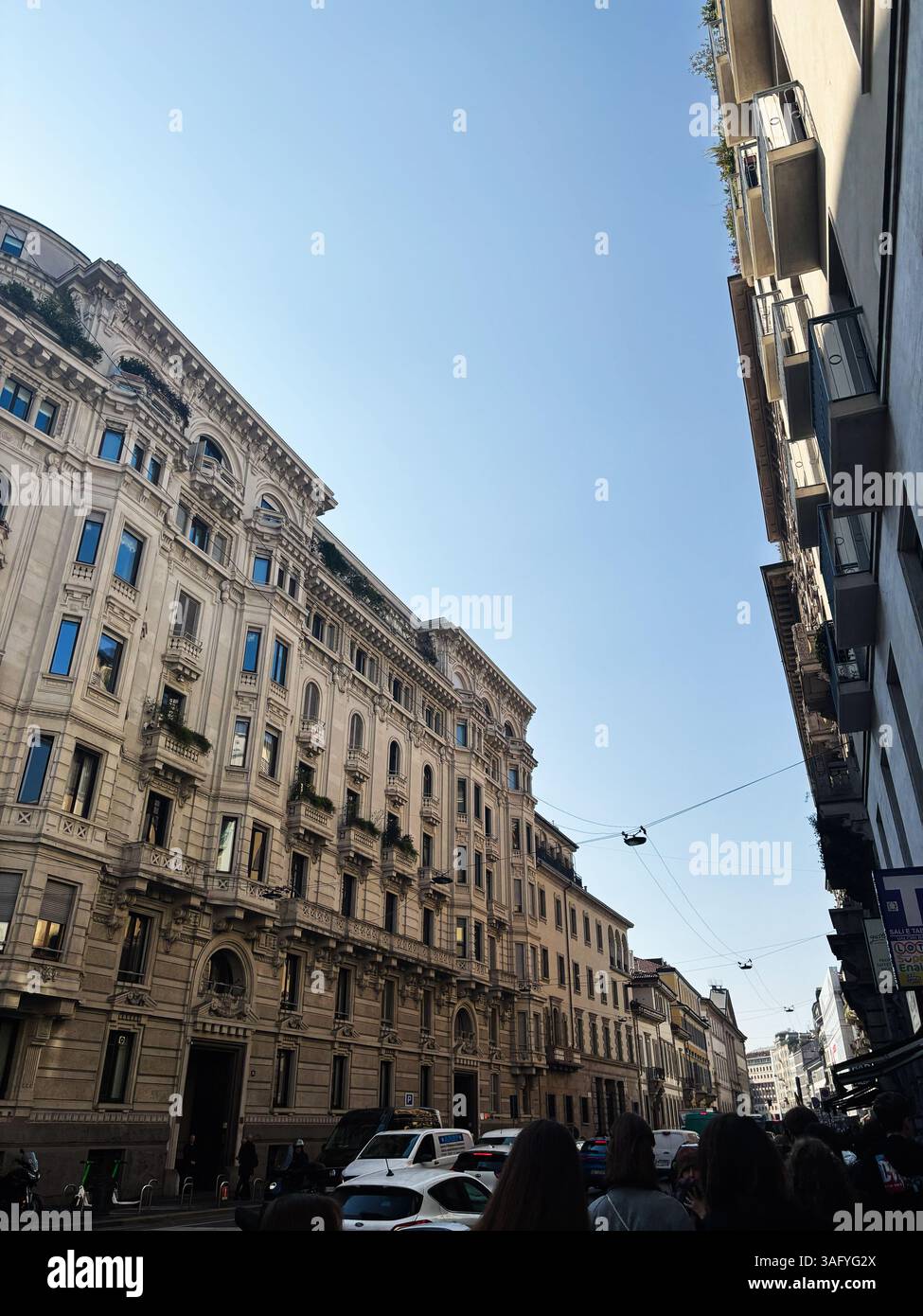 Milan, Italy - March 26, 2025: Classic architectural buildings in Milan ...