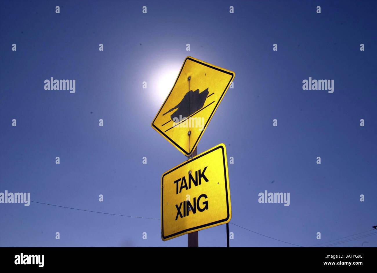 Traffic signs mark a tank crossing zone at the National Training Center ...