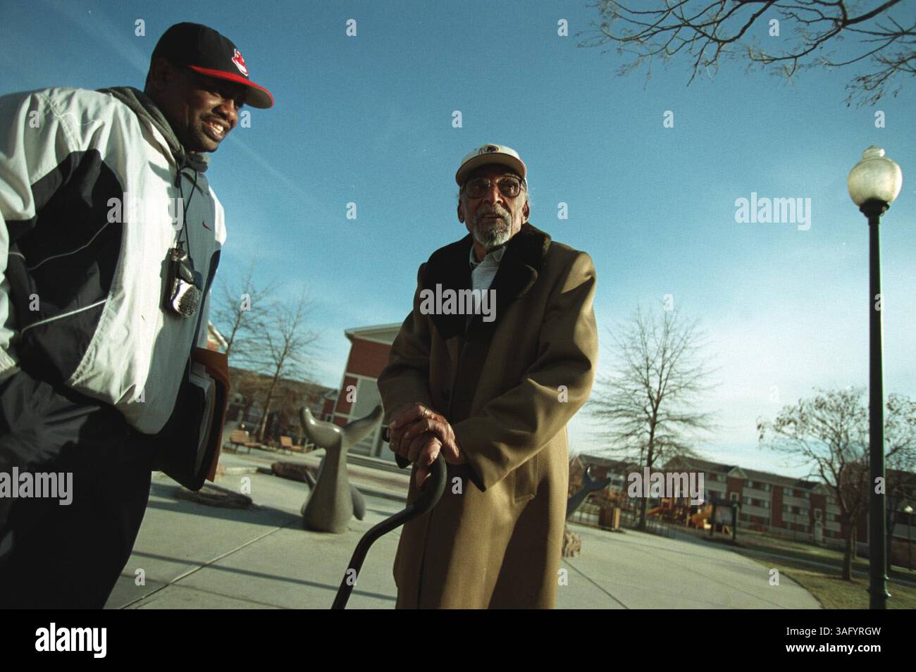 Metropolitan Police officer Jeffrey O. McLaughlin, left, chats with ...