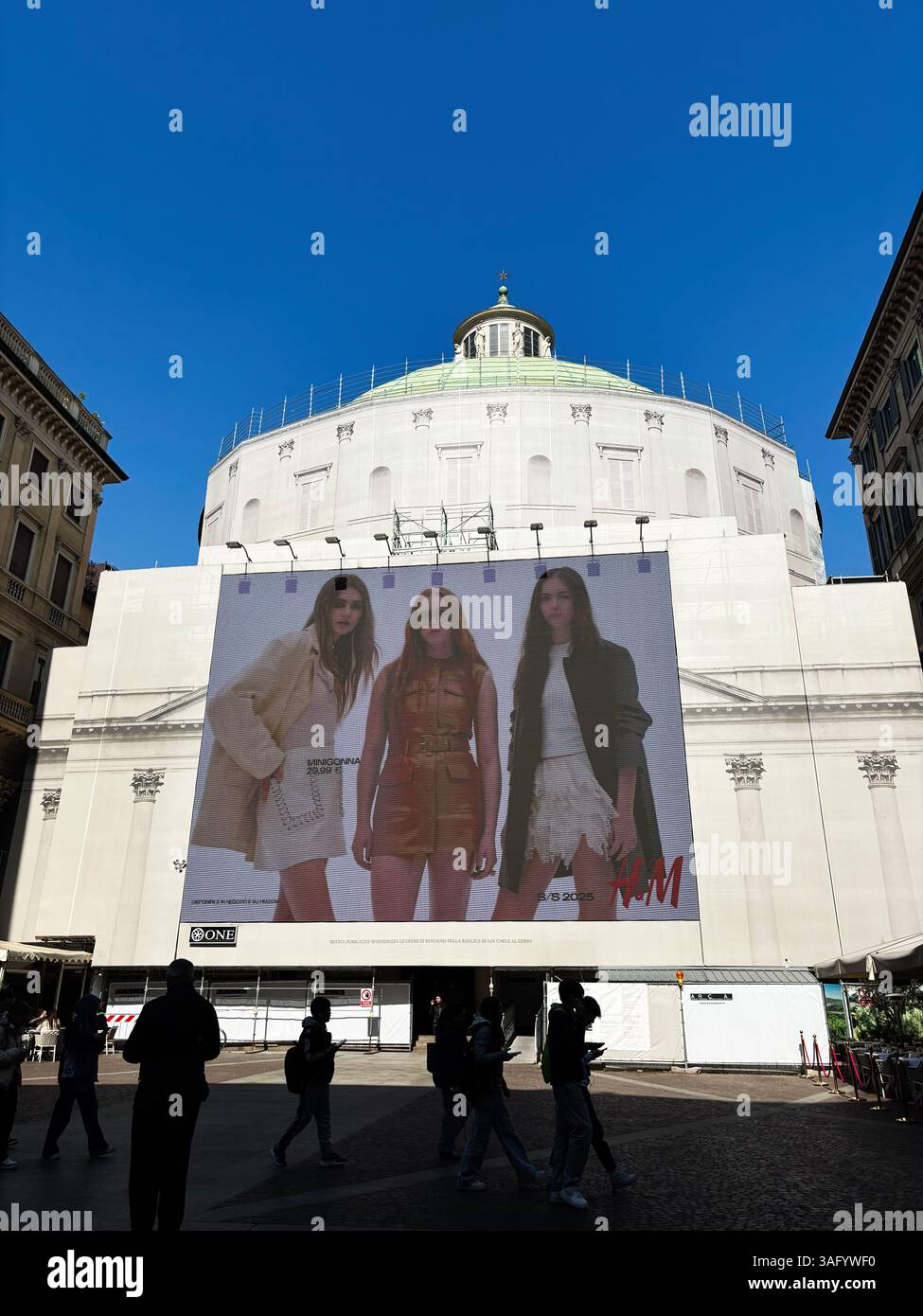 Milan, Italy - March 26, 2025: High-fashion advertisement displayed on ...