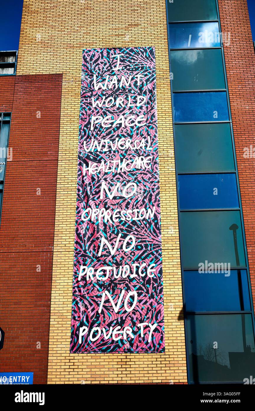 Large vertical world peace banner hanging on the wall of the Grand ...