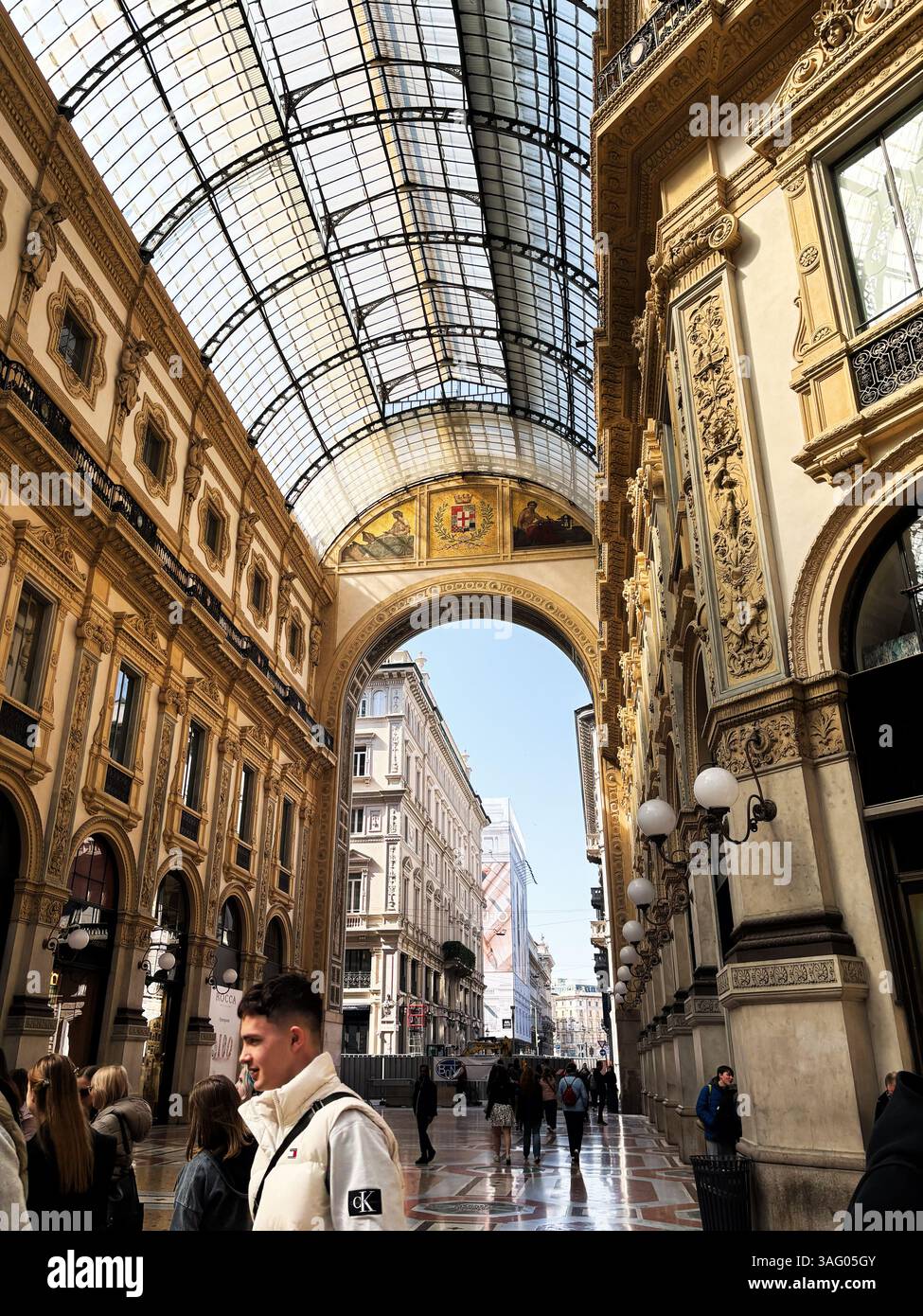 Milan, Italy - March 26, 2025: A bustling view of Milan's iconic ...