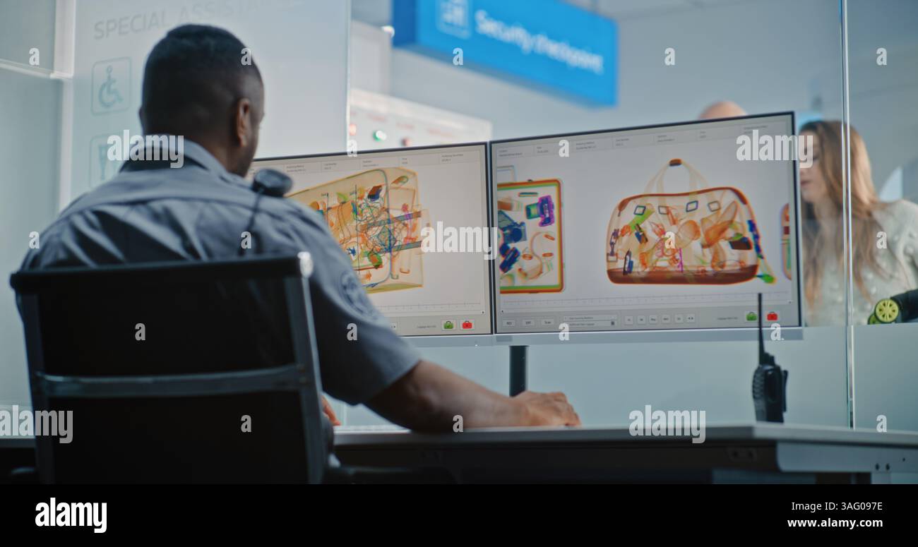 Airport Security Checkpoint: African American TSA Worker Controlling X ...