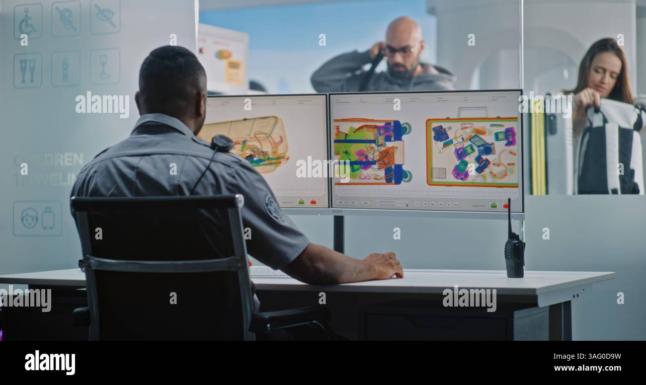 Airport Security Checkpoint: African American TSA Worker Controlling X ...