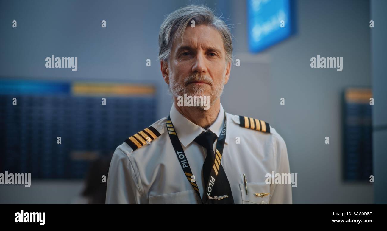 Airport terminal mature airline pilot hi-res stock photography and ...