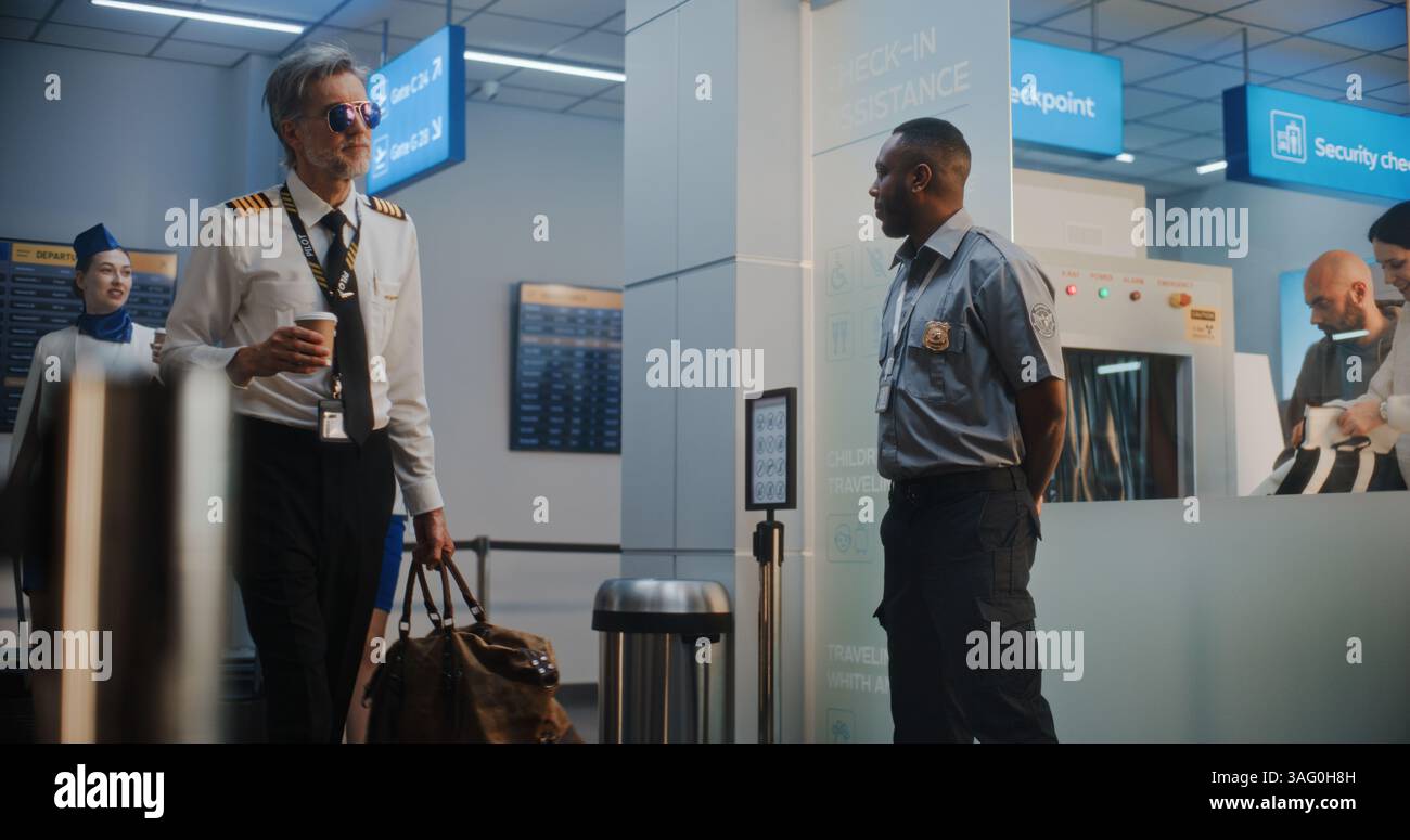 Flight Crew in Airport Terminal: Mature Airline Pilot and Two Beautiful ...