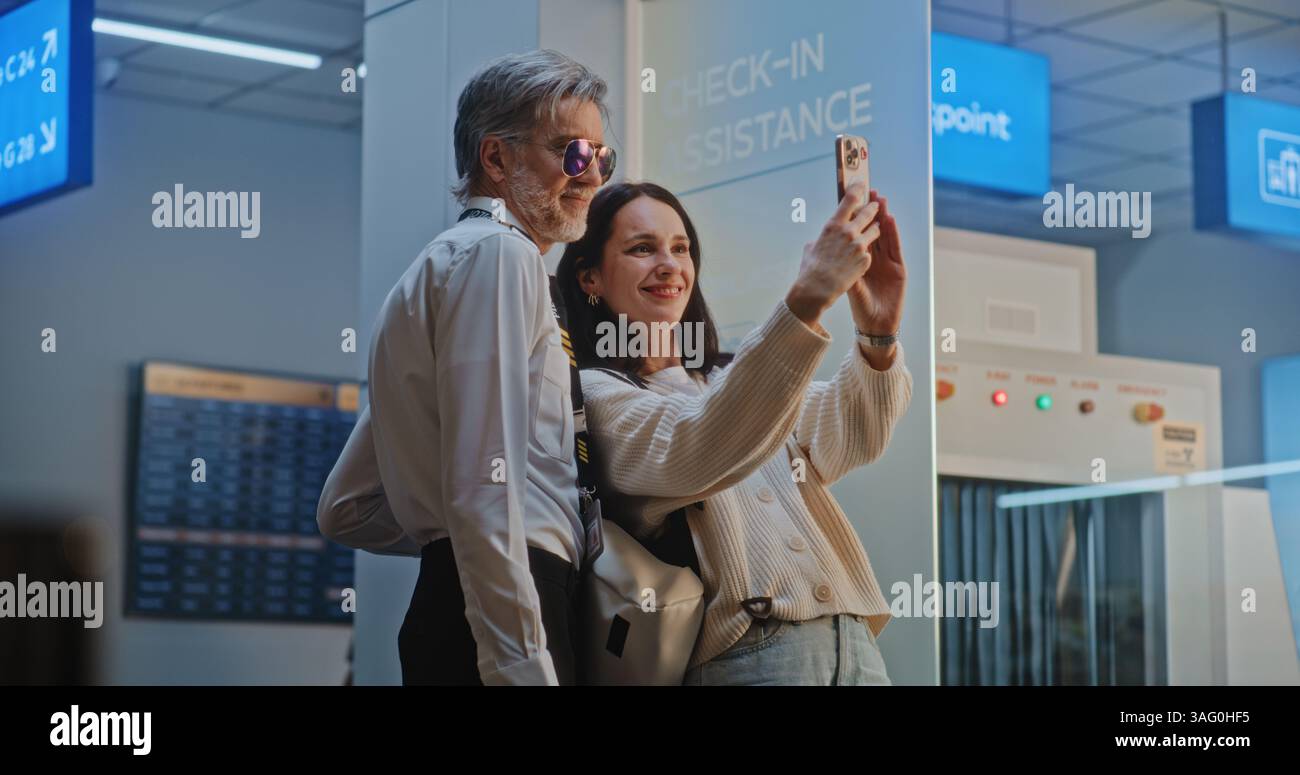 Professional Pilot in Uniform Drinking Coffee, Using Phone, Waiting for ...