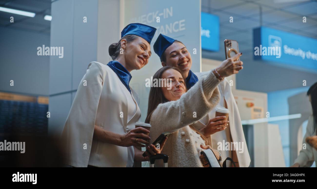 Two Beautiful Flight Attendants in Elegant Uniforms Talking, Waiting ...
