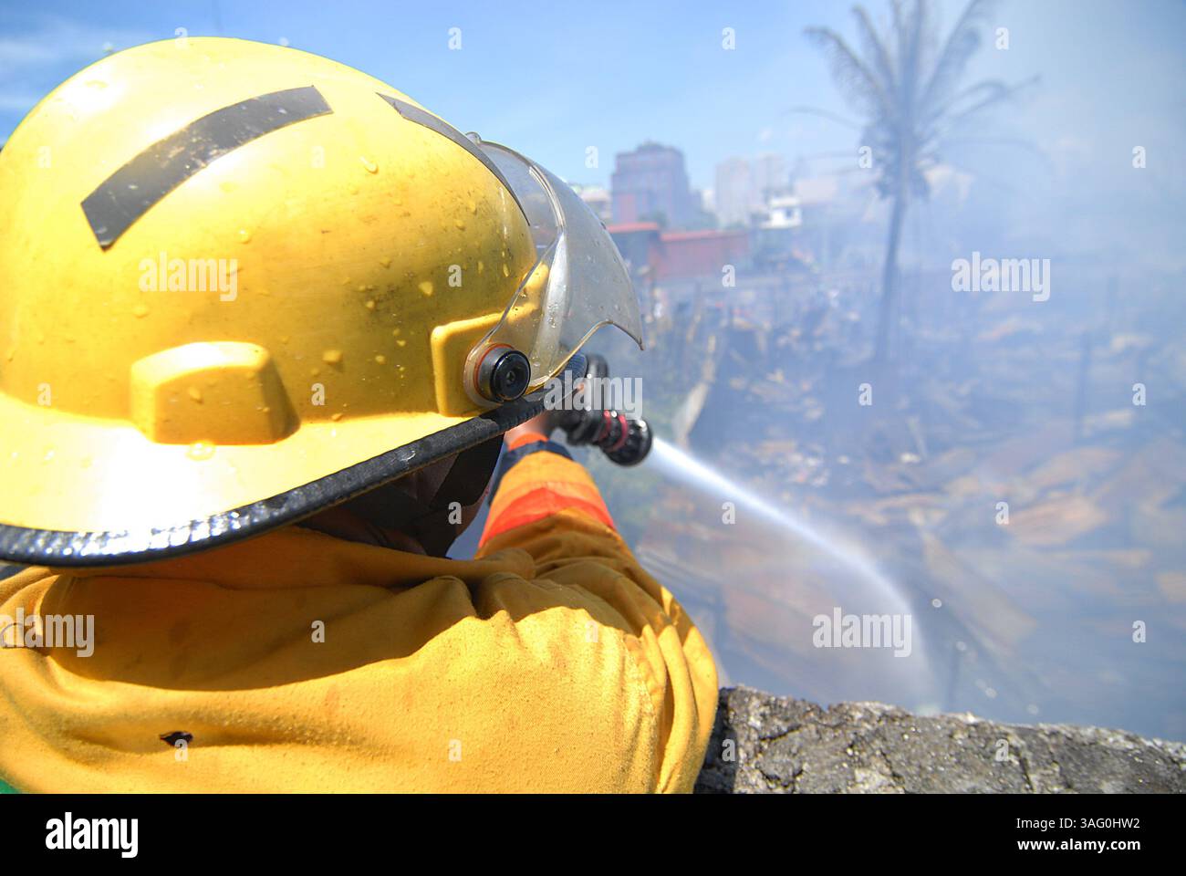 Aug. 22, 2012 - Manila, Philippines - A fireman continues to put out ...