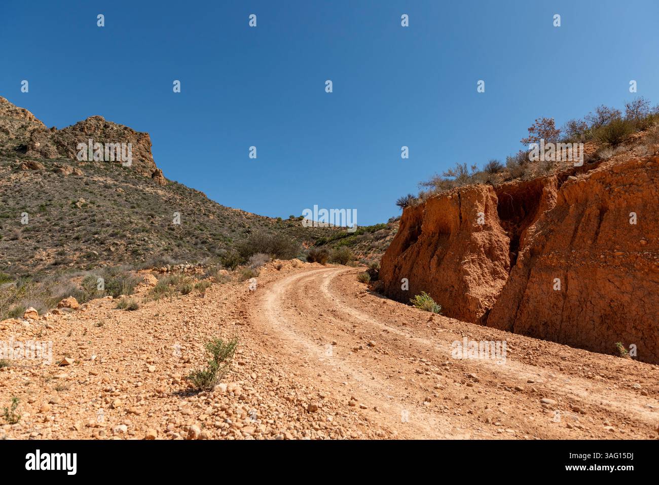 Beautiful scenery with winding gravel dirt road, Costa Blanca ...