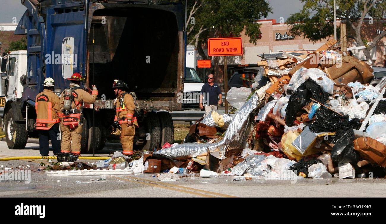 Clearwater, Fl 11/12/2007).NP 277971 DEAN GARBAGE 1.Caption: Emergency workers from Clearwater ...