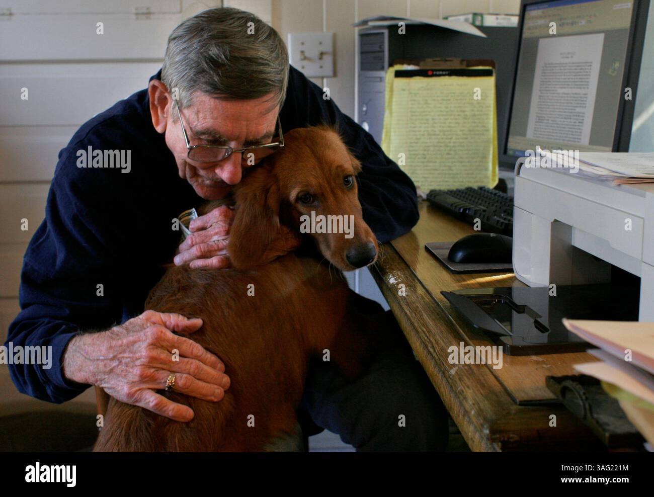 CAPTION: (St. Petersburg, 1/03/2008) Ted Dahlem (cq) hugs 4-month-old ...