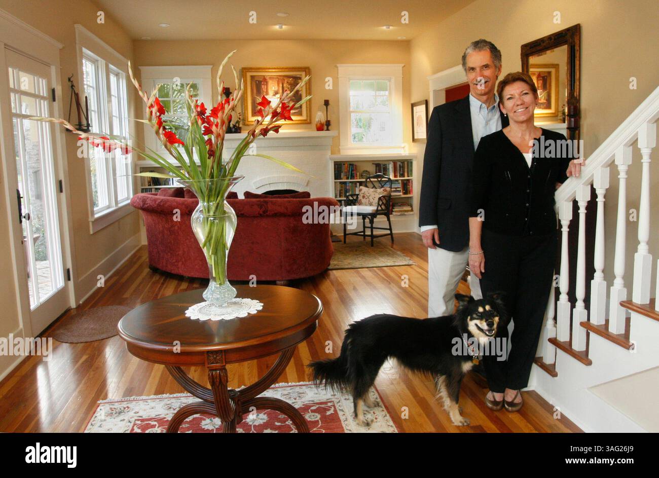 Tampa 2/22/2008) Dave and Mary Heise and their dog Molly stand in their ...