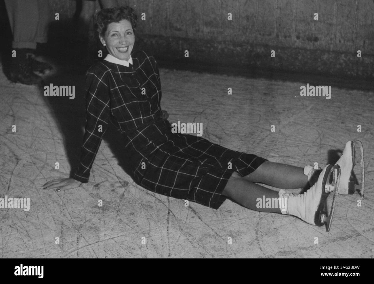 On an Australian skating rink, Jennie Broad comes down in a forced ...