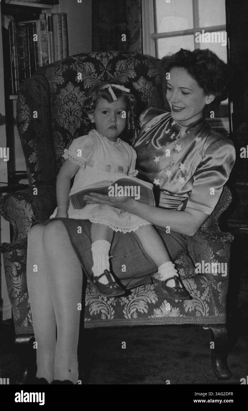 Mother is Britain's £1,000,000 Box office hit. Photo Shows: Miss Phyllis Calvert reading to her ...