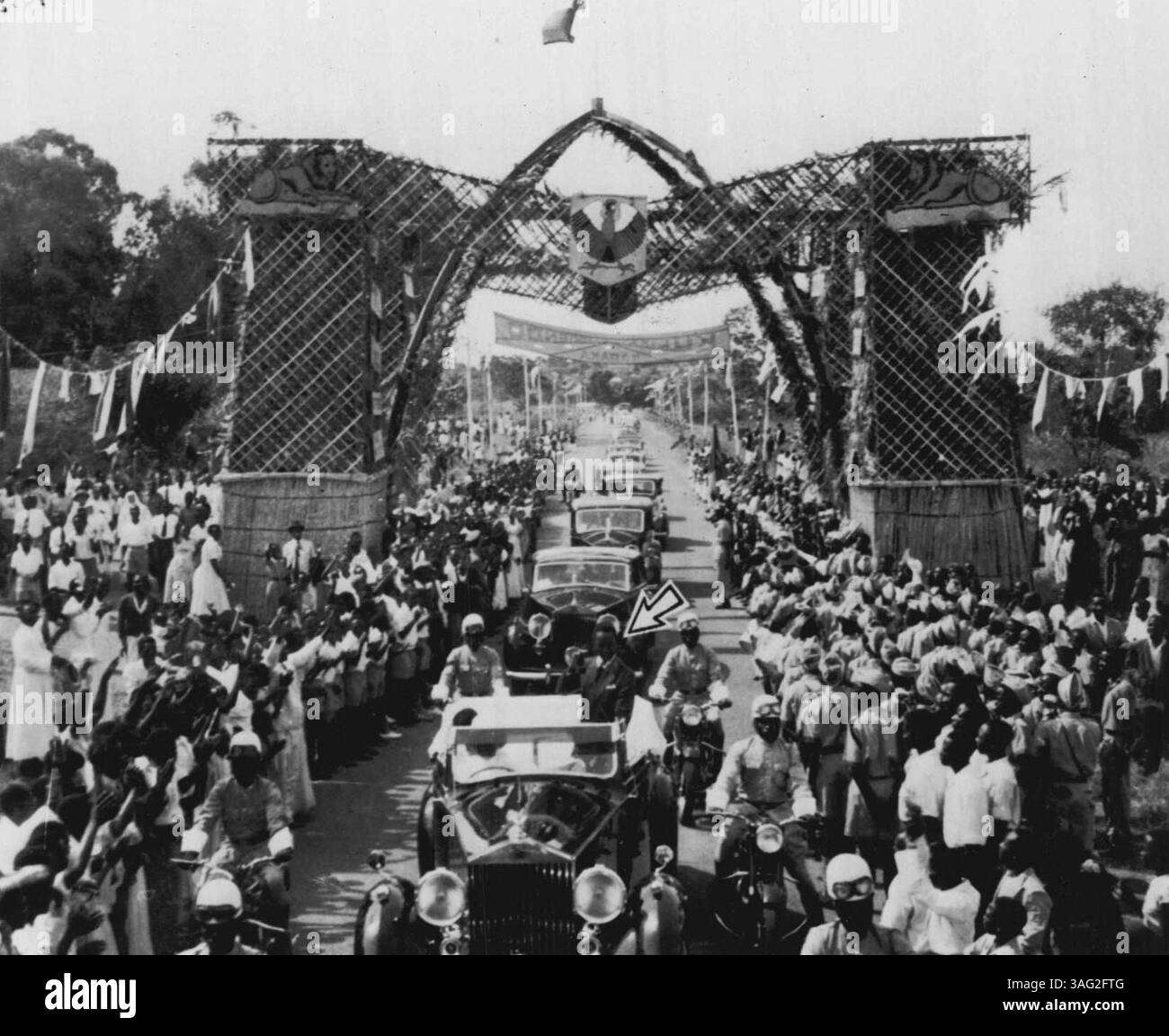 The Kabaka of Bugand, King Frederick Mutesa II,arrow, stands in open ...