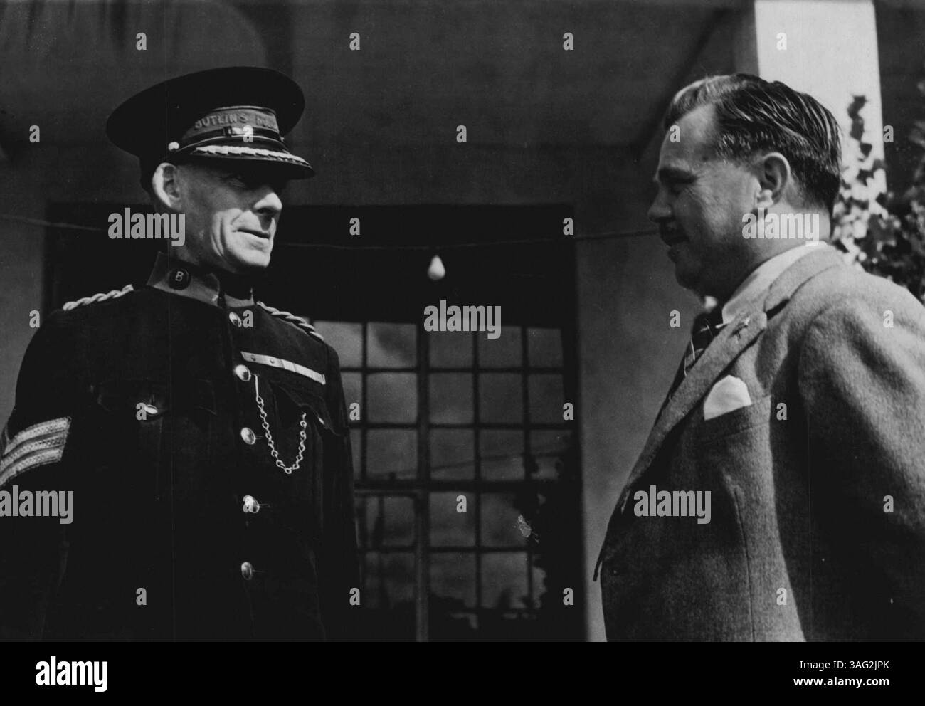 Billy Butlin with sergeant J, Caffery V:C., one of the Commission aires ...