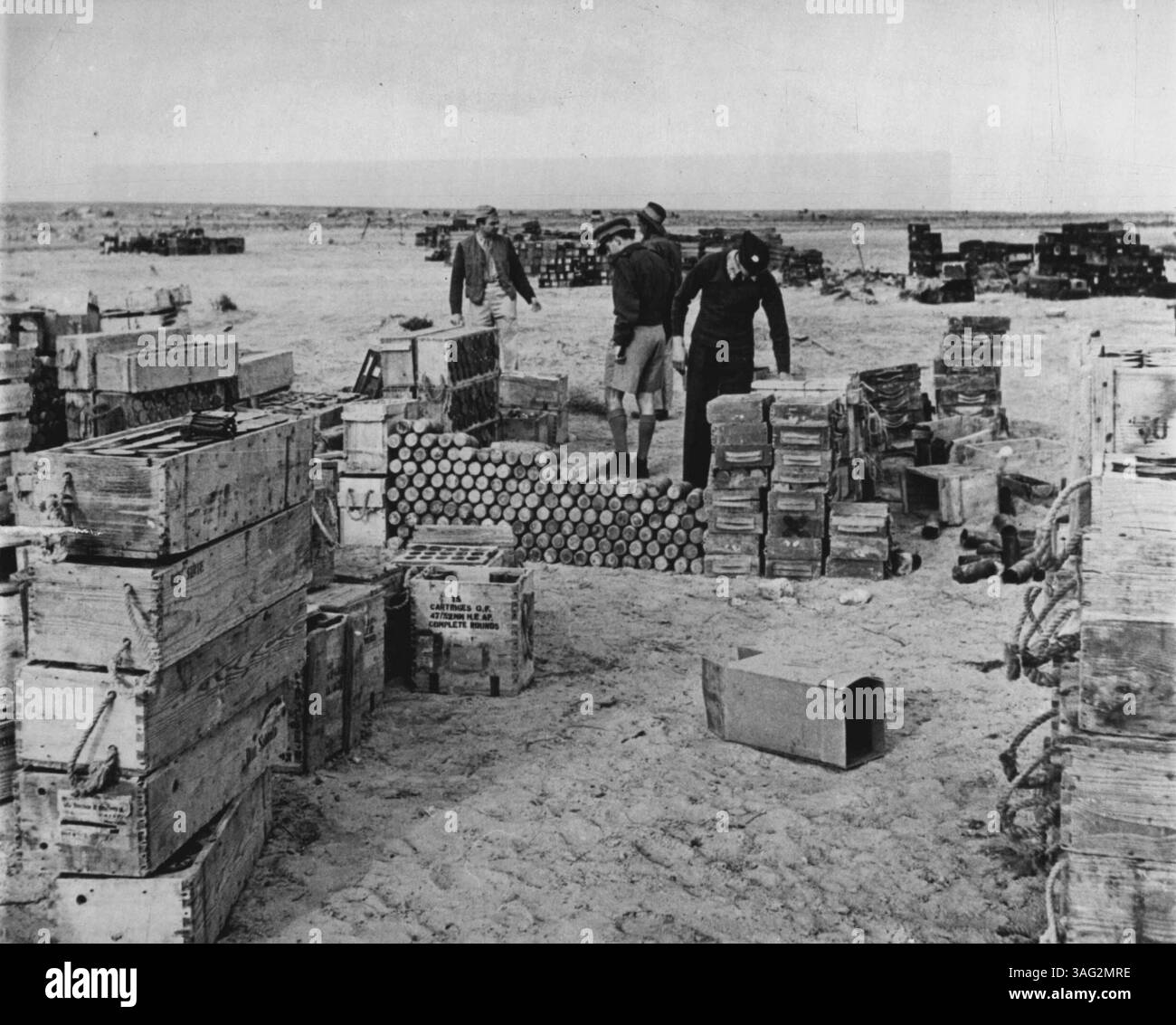 Italian Munition Dump Captured By British - British officers inspect an ...