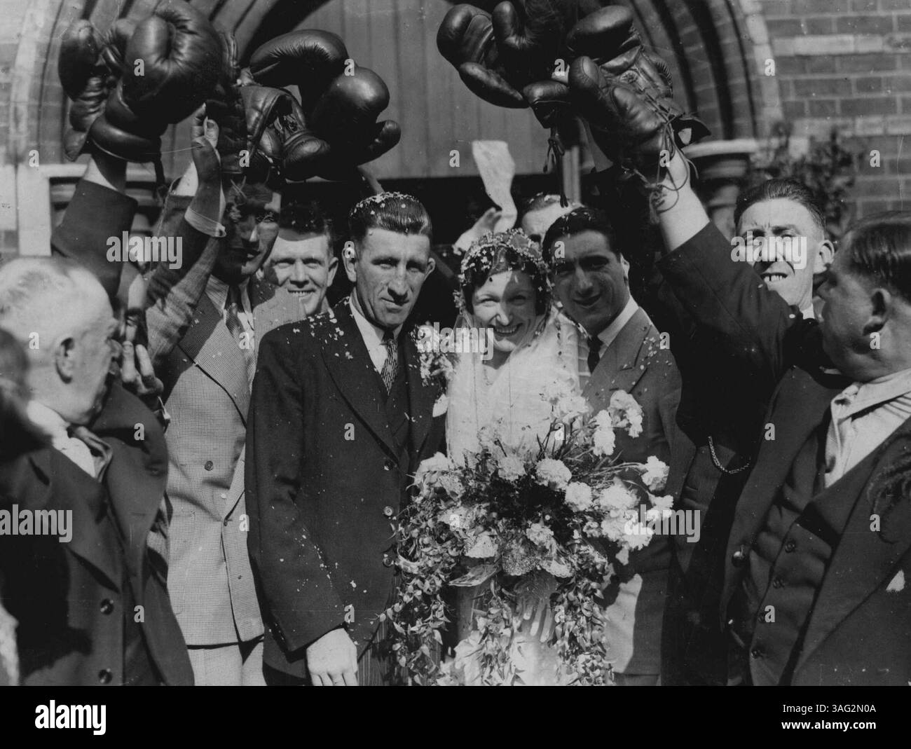 Photo Shows: Al Burke and his bride leaving the church through a Guard ...