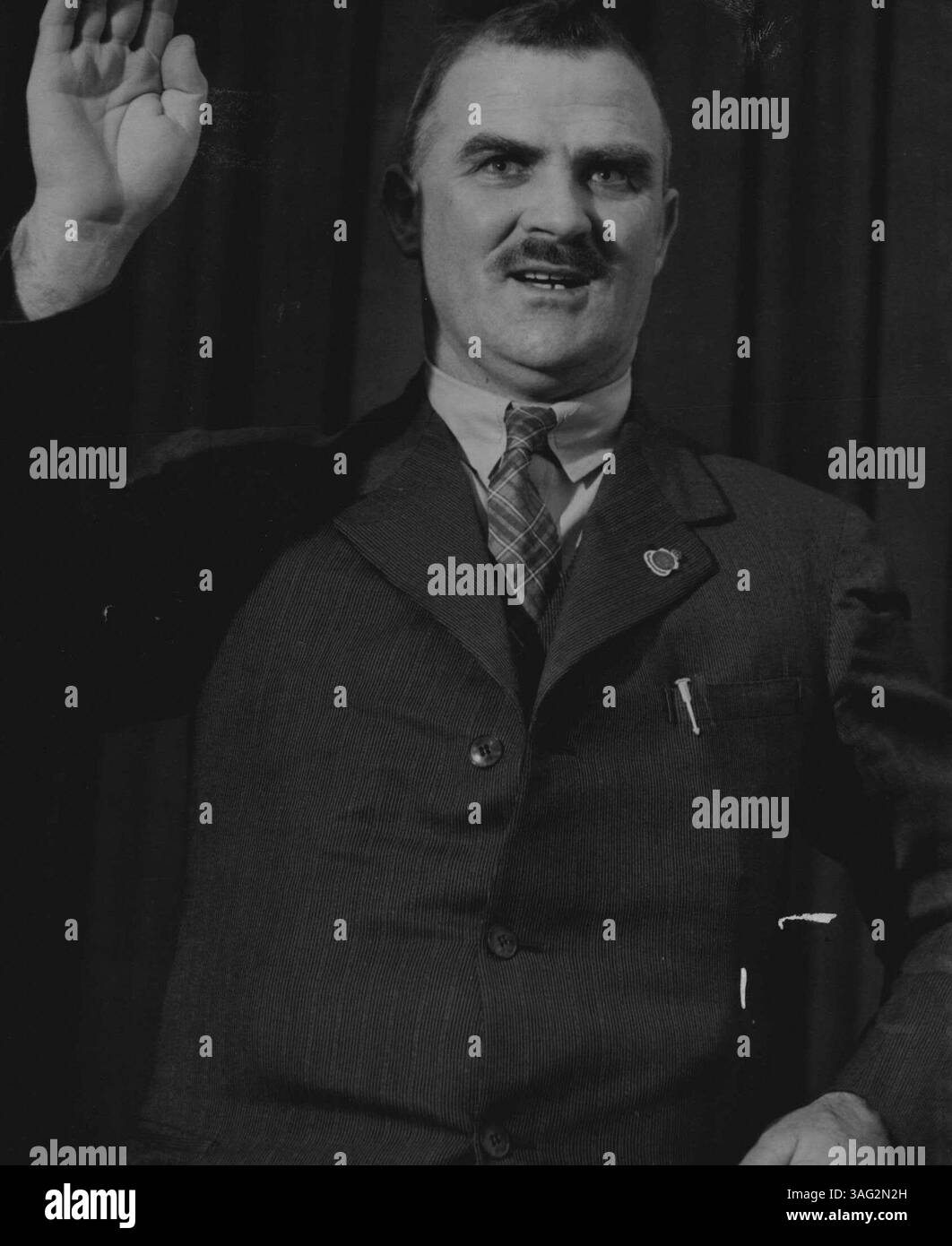 A typical Archie Cameron of the moustache days. This was in 1938 when ...