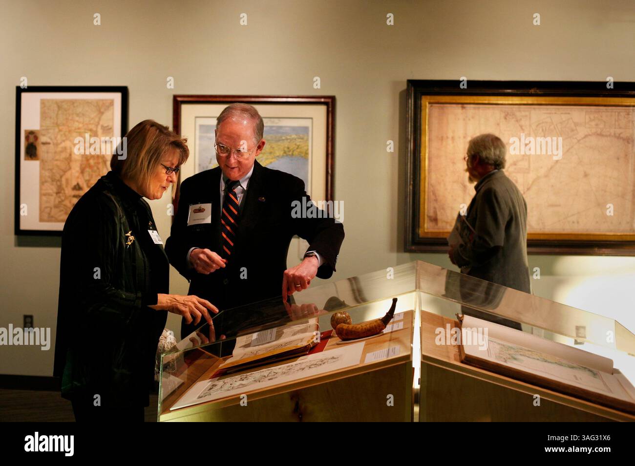 Tampa1/14/2009) Phyllis Alexandroff listens to Tom Touchton describe a ...