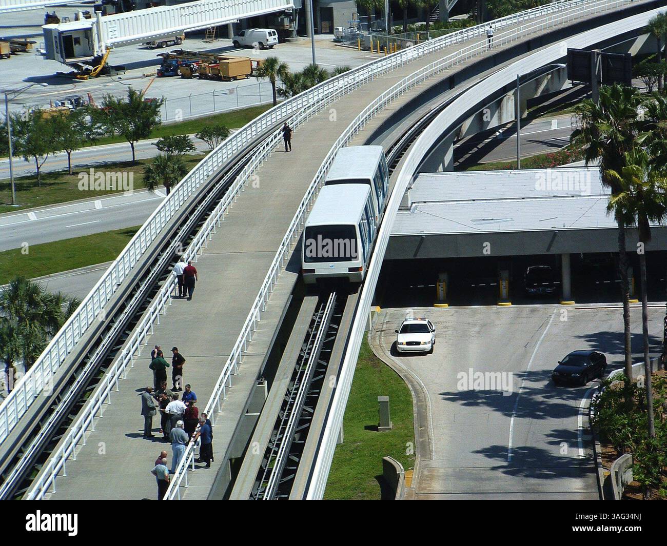 A man wanders out into shuttle bridge between TIA terminal and Airside ...