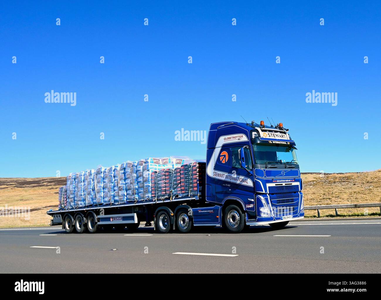 Stewart International Transport HGV, travelling at speed on the M6 ...