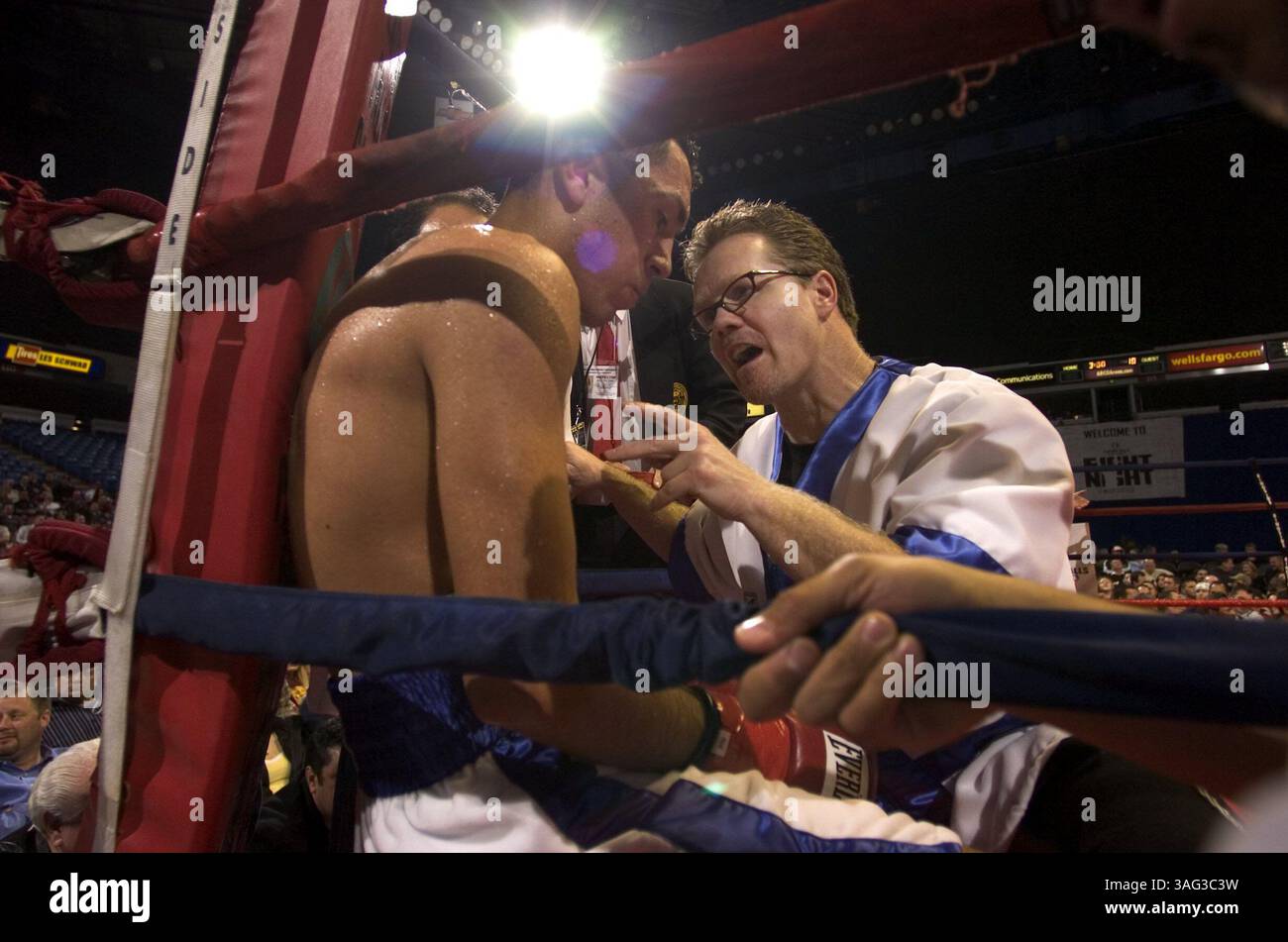 FOURTH -- Boxing trainer Freddie Roach (cq-center), gives instructions ...
