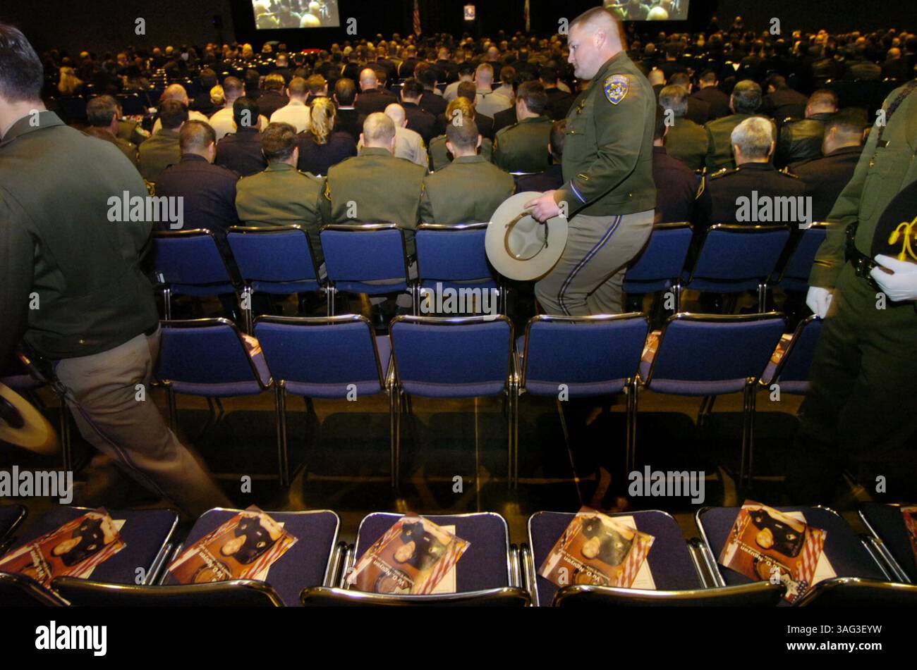 CHP officer Jeremy Linson, center, finds a seat as law enforcement ...