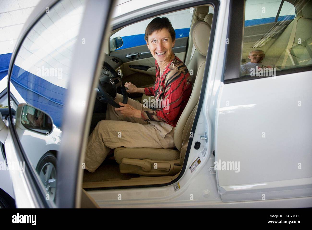LEDE - Bea Kandra of Sacramento smiles at her husband, Ron Beckler, as ...