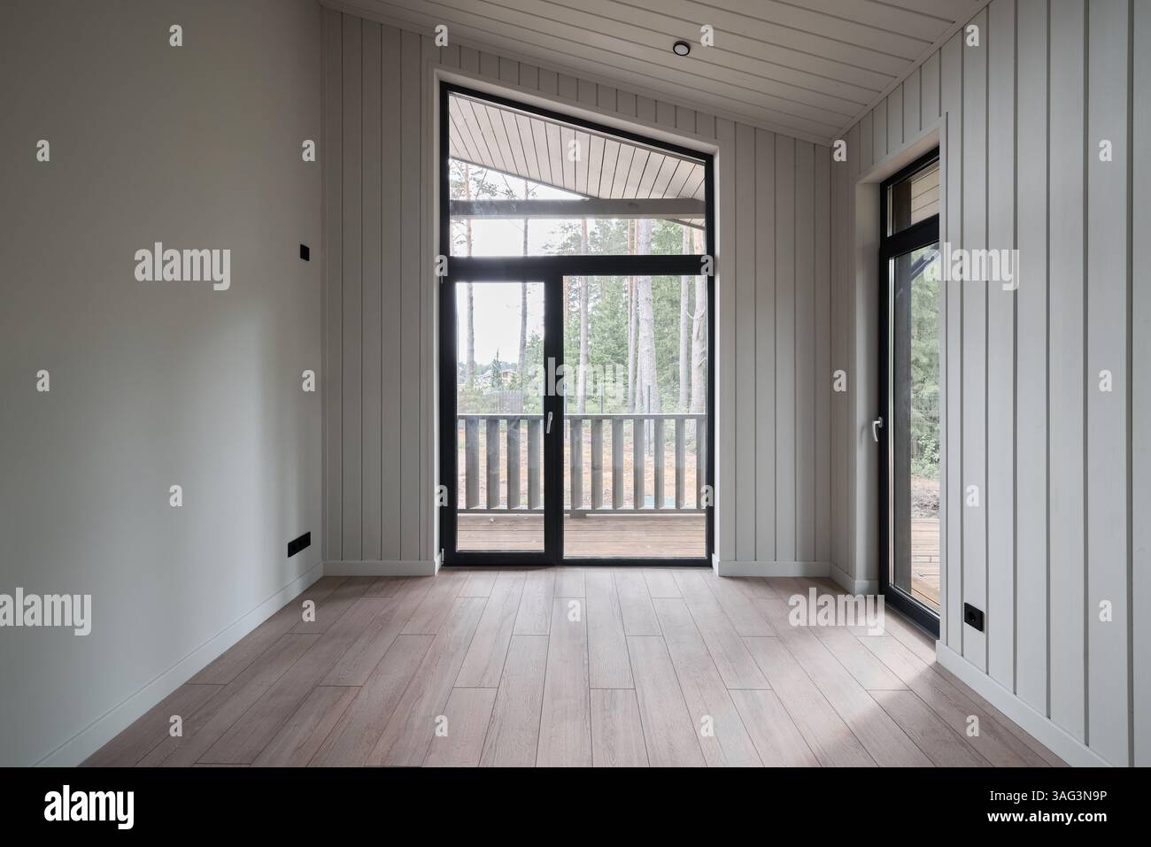 Stylish and Contemporary Modern Interior Featuring Large Windows with ...