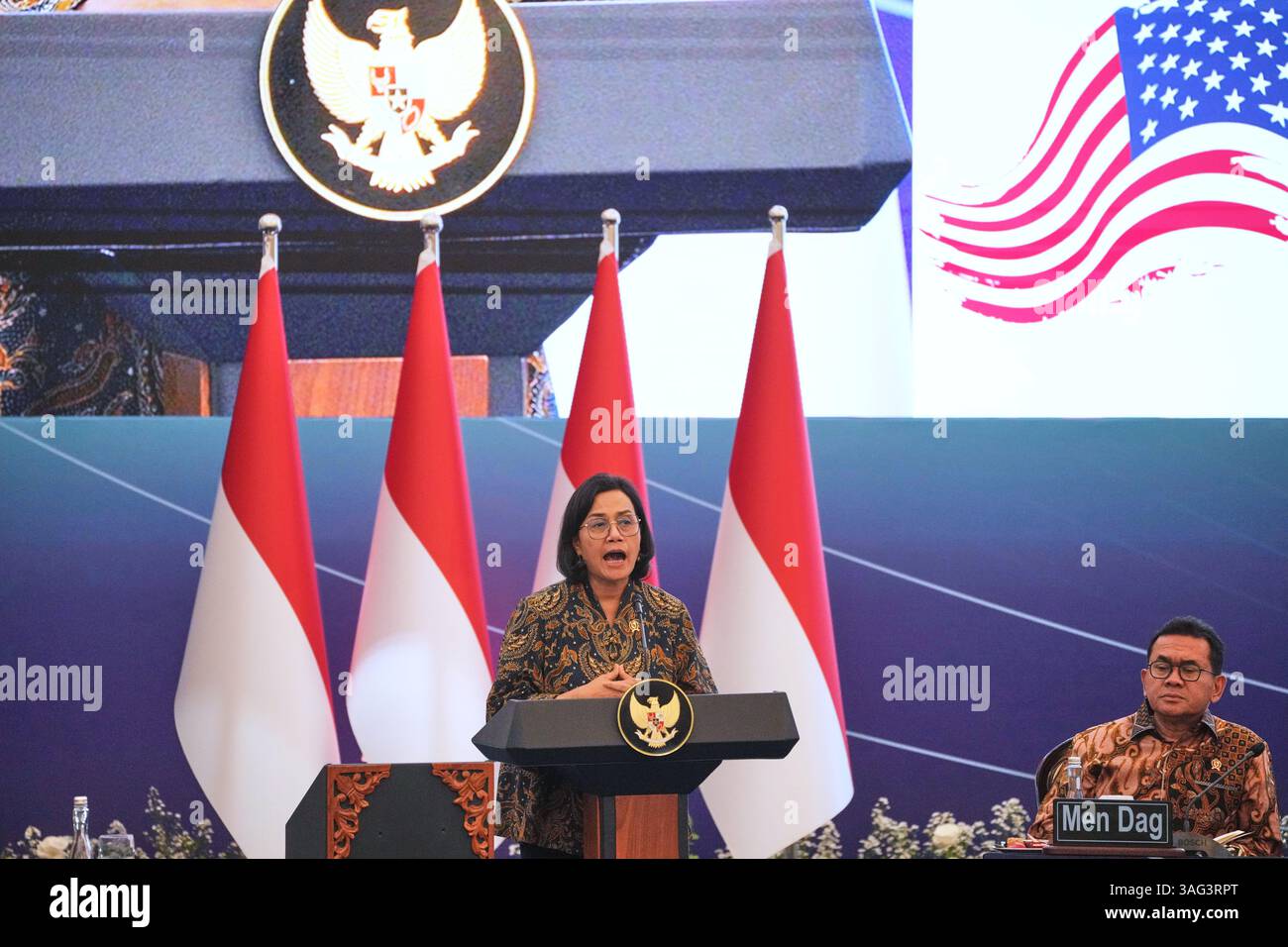 Indonesian Finance Minister Sri Mulyani Indrawati delivers a speech ...