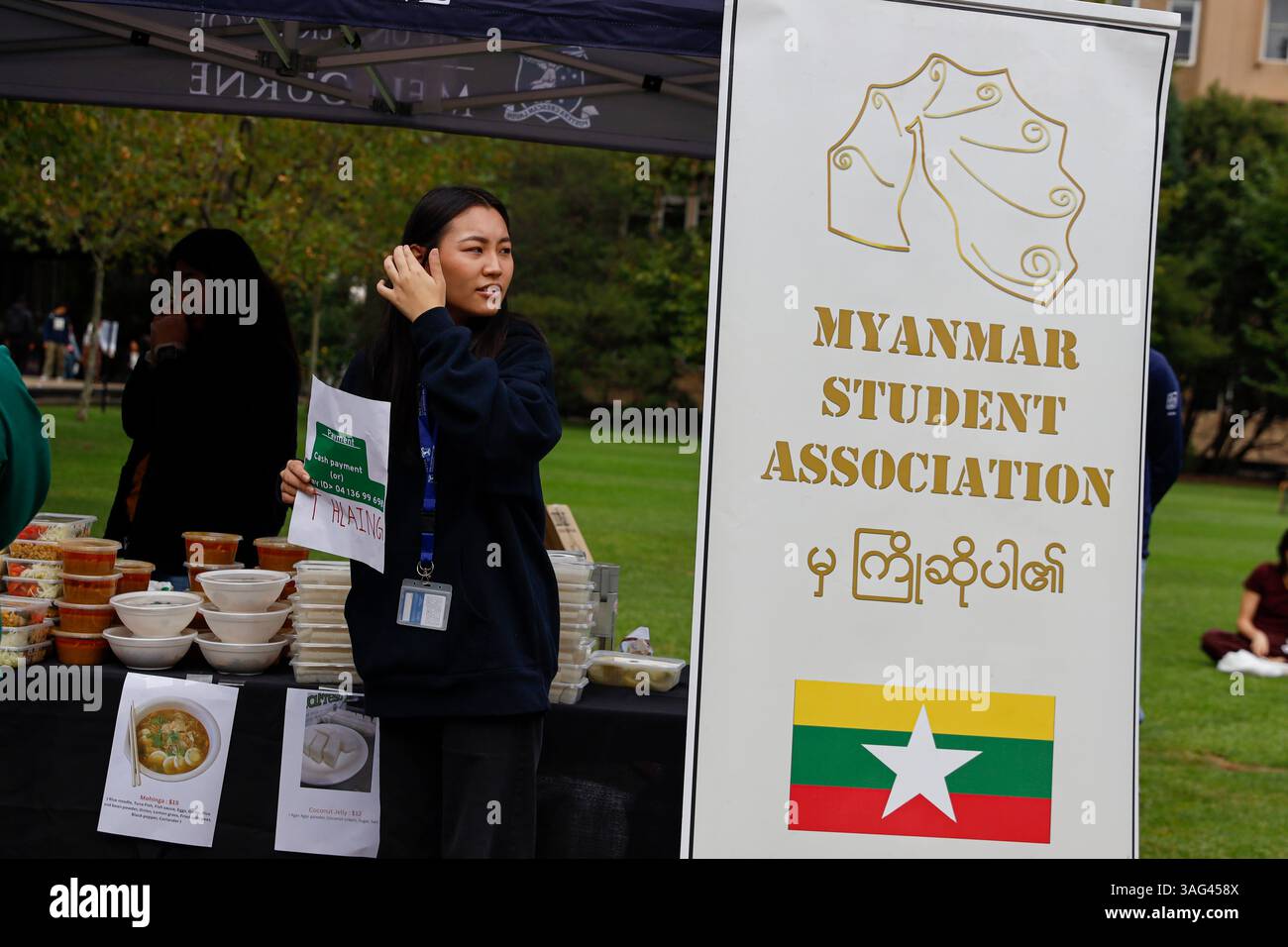 Thiri Hlaing Yang, President of the Myanmar Student Association holds a ...