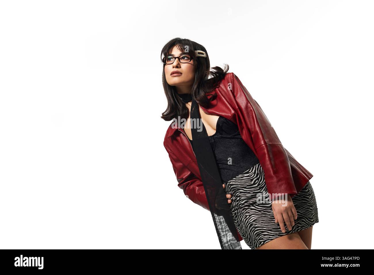 Confident young asian woman expresses her unique fashion sense with a ...