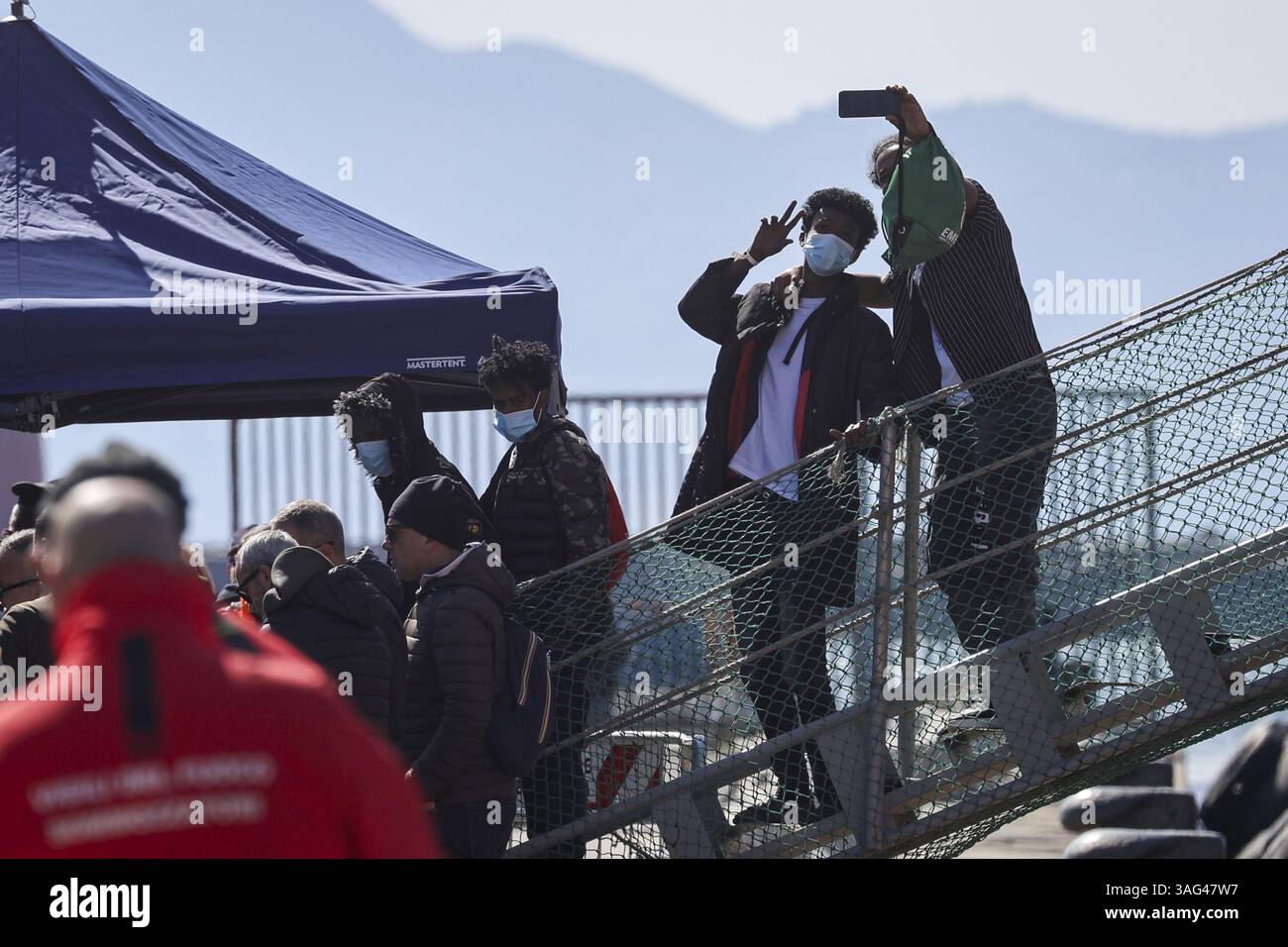 Naples, Italy. 08th Apr, 2025. Migrants disembark from Gino Strada's ...