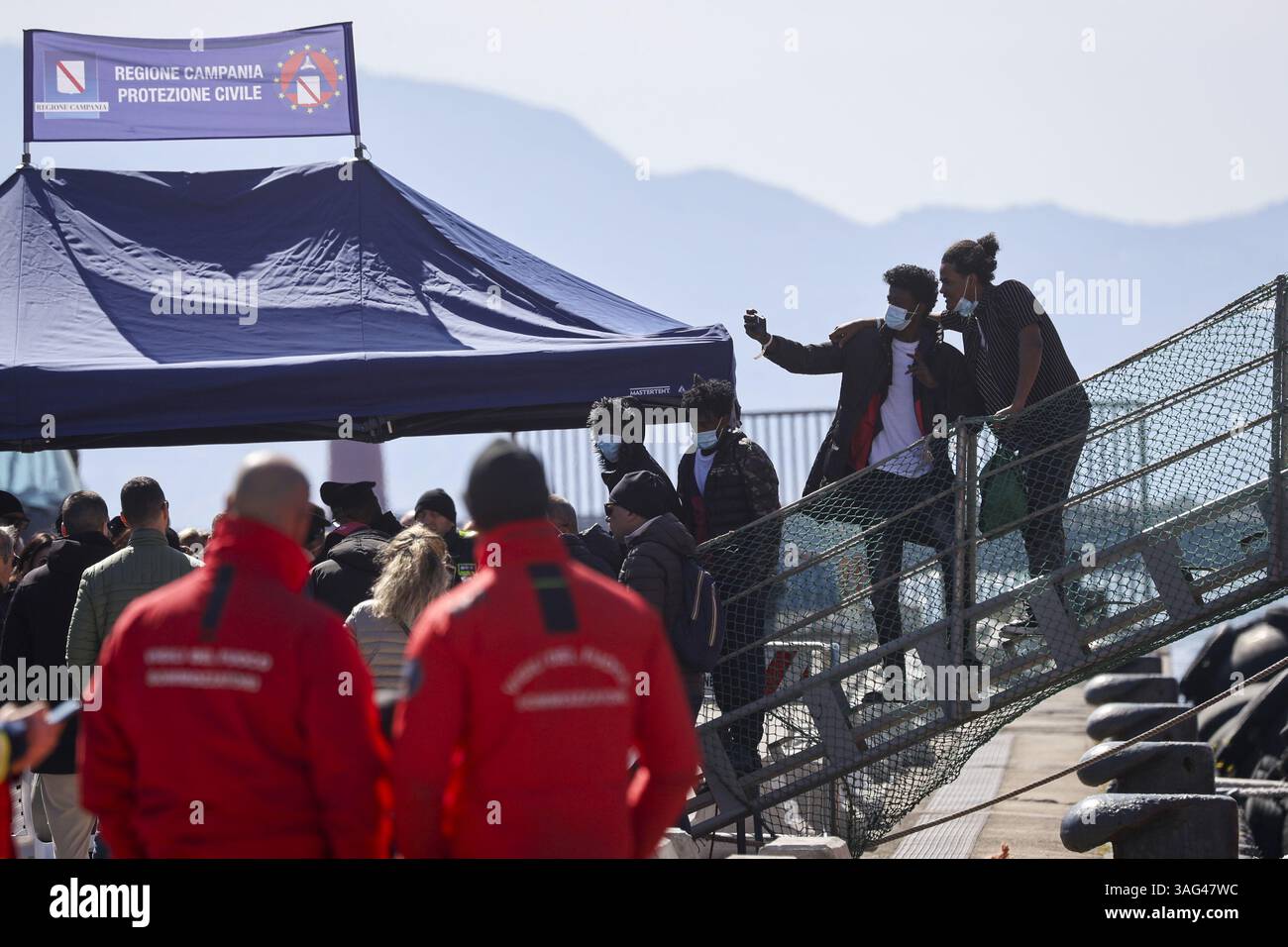 Naples, Italy. 08th Apr, 2025. Migrants disembark from Gino Strada's ...