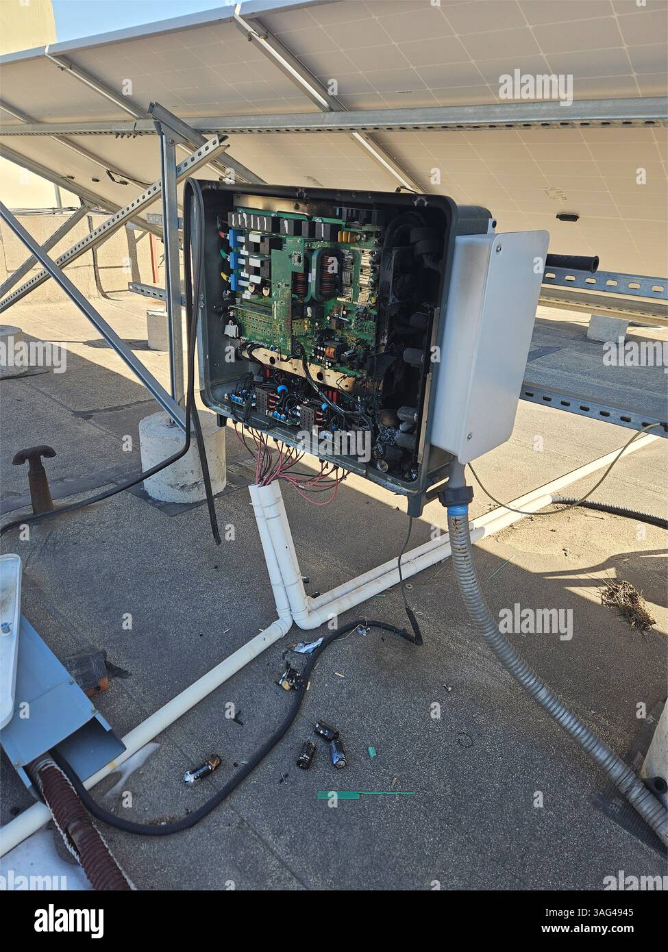 Damaged Solar Inverter After Explosion – Close-Up of Exposed Circuitry ...