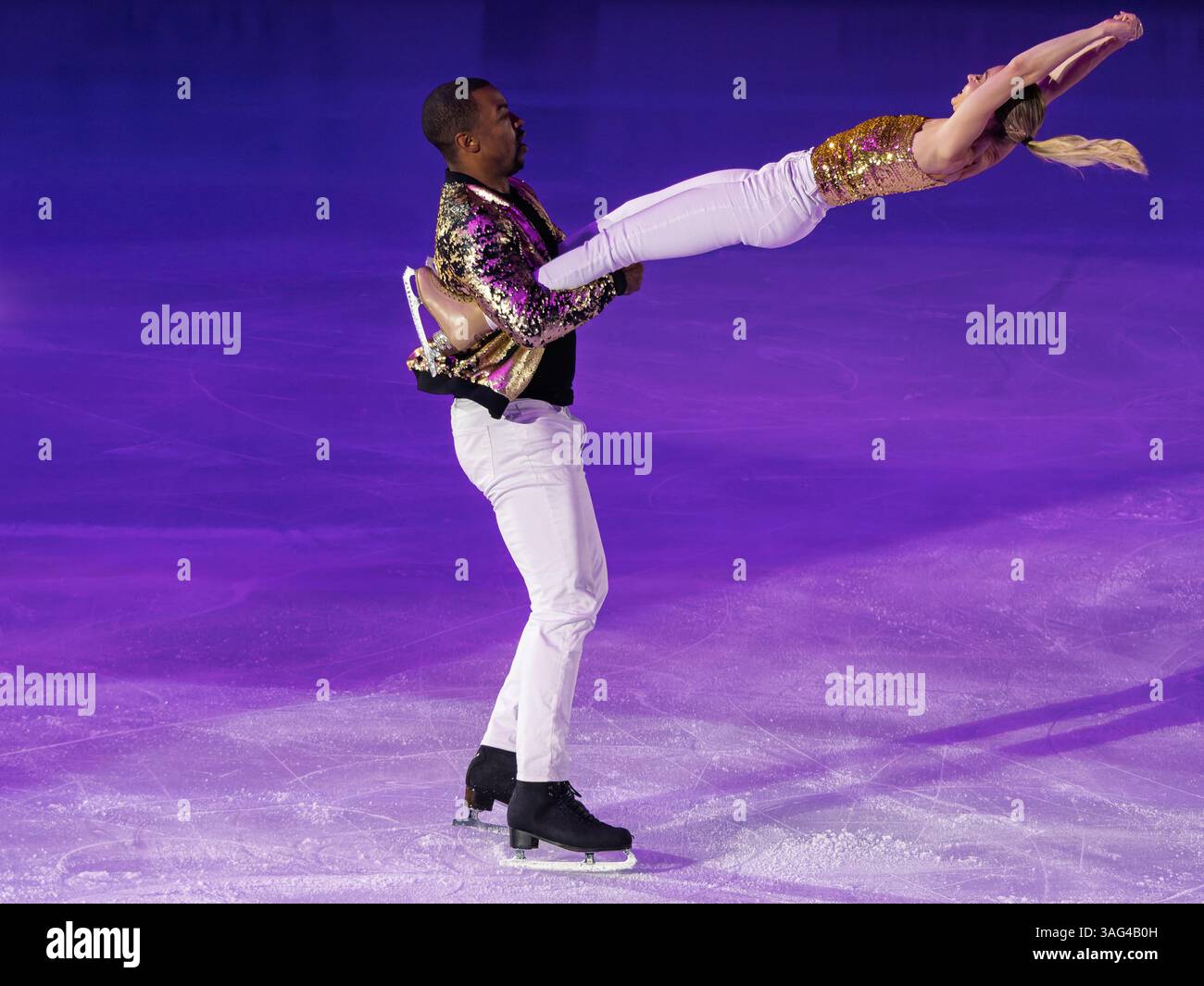 Couple performing Artistic and Technical performance on the Ice Rink ...