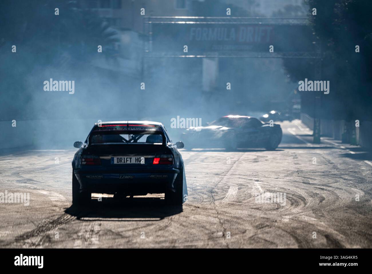 Adam LZ waits to enter the starting position while Matt Field warms up ...
