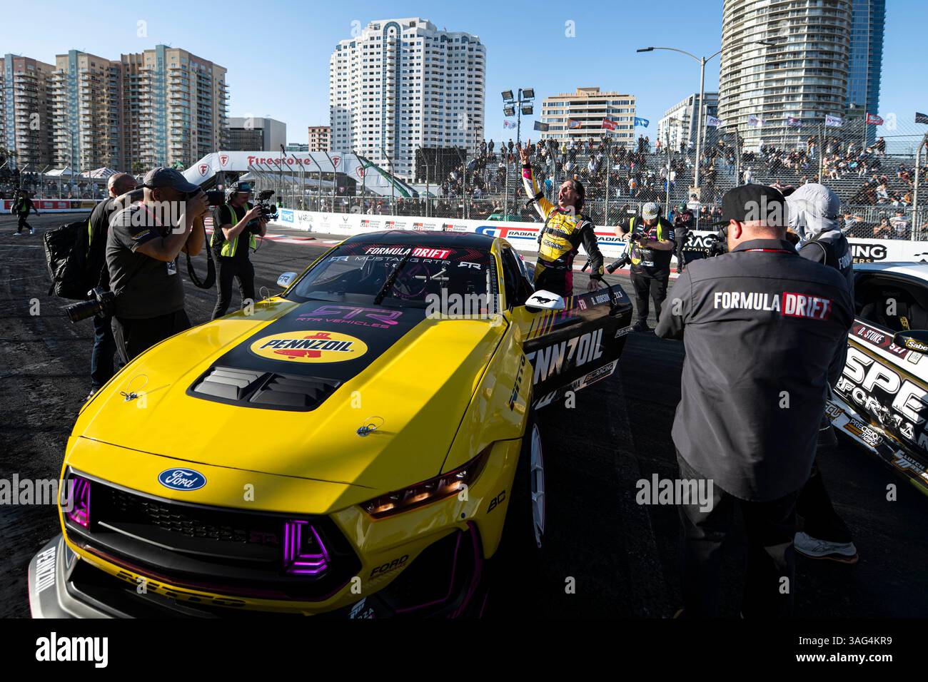 Ben Hobson driver of the RTR Mustang celebrates after taking 2nd in the ...