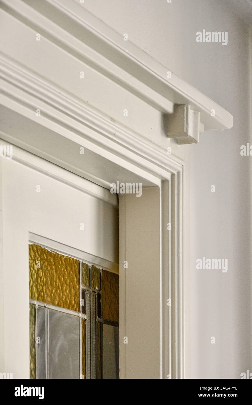 Intricate design of a door frame featuring beautiful glass accents. The ...