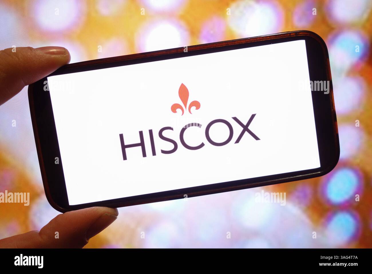 In this photo illustration, the Hiscox company logo is seen displayed ...